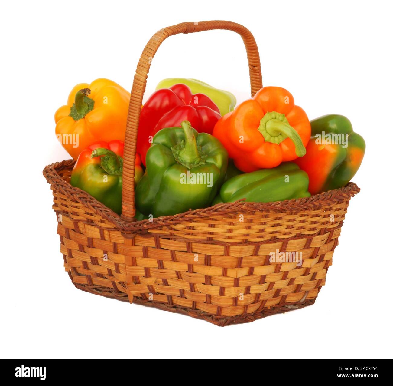 Colorful sweet peppers in basket isolated on white landscape Stock ...