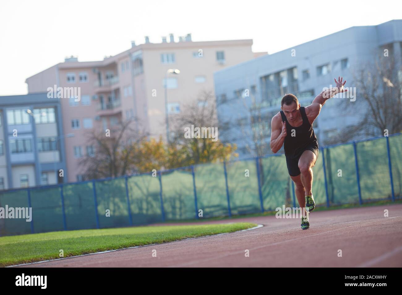 Athletic man start Stock Photo - Alamy