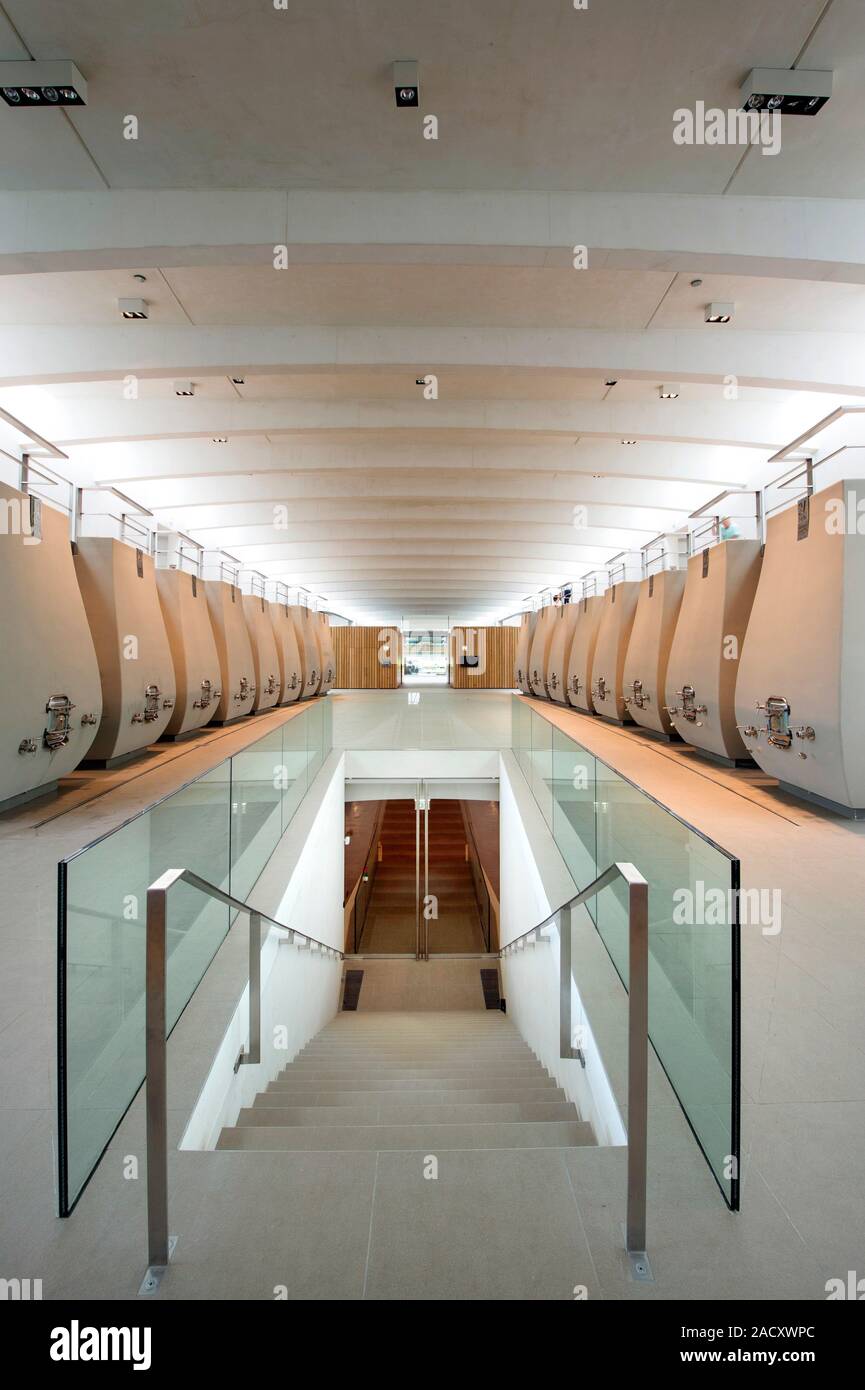 Concrete wine vats in the Cheval Blanc winery, Saint-Emilion, France ...
