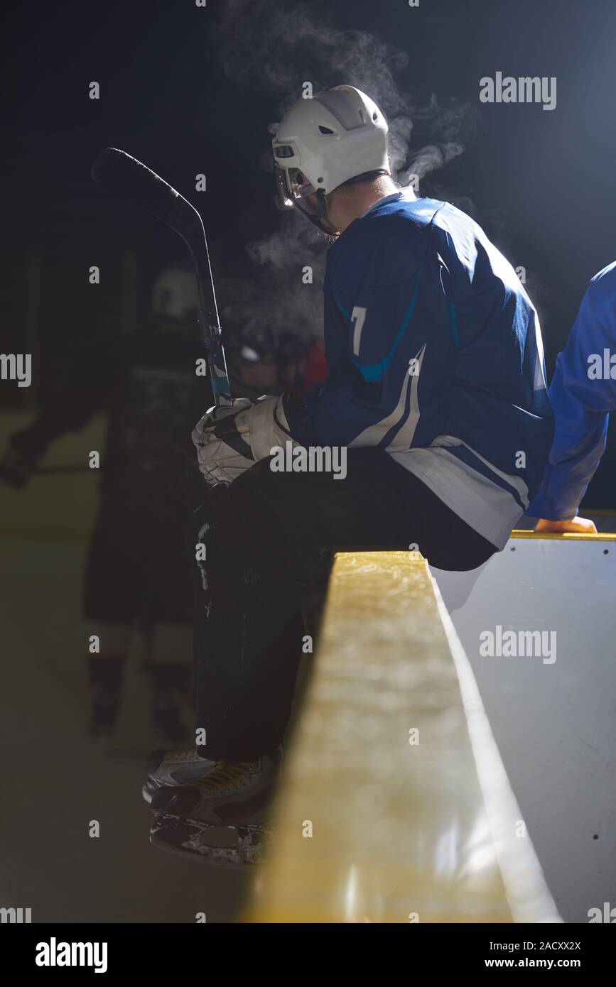 ice hockey players on bench Stock Photo - Alamy
