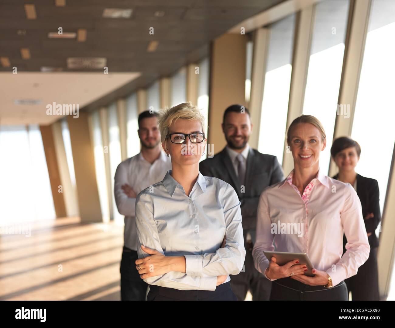 Business people group standing together Stock Photo - Alamy