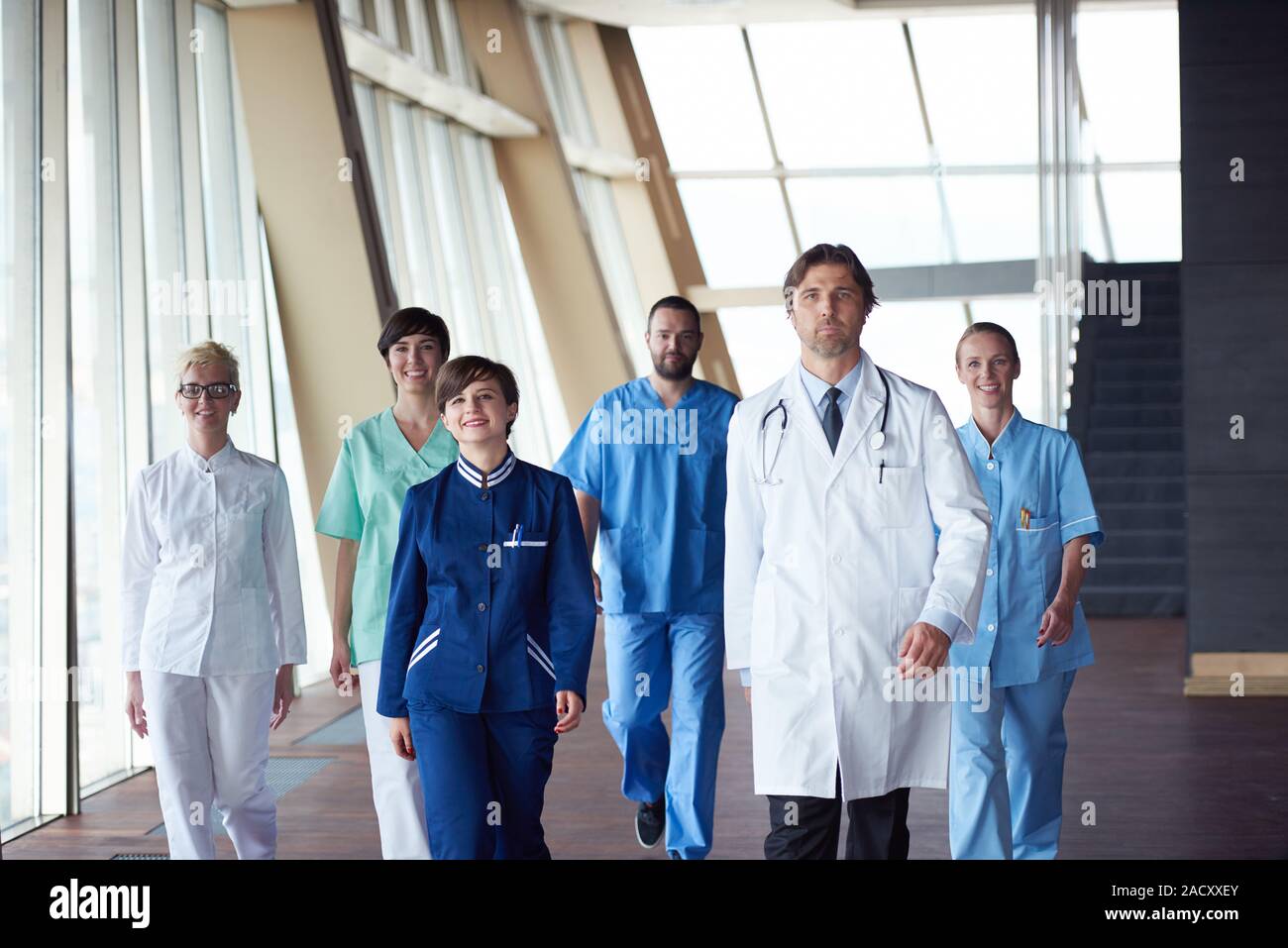 Group of female nurses walking hi-res stock photography and images - Alamy