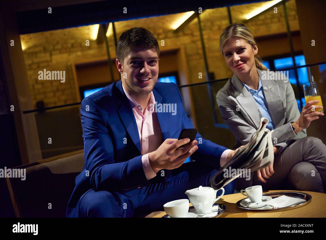 business couple take drink after work Stock Photo - Alamy