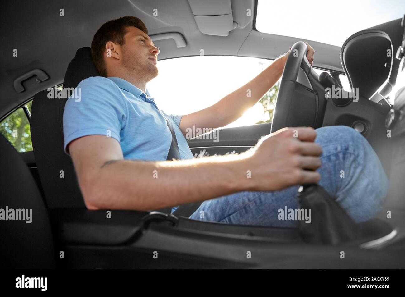 transport, vehicle and people concept - man or driver driving car in ...
