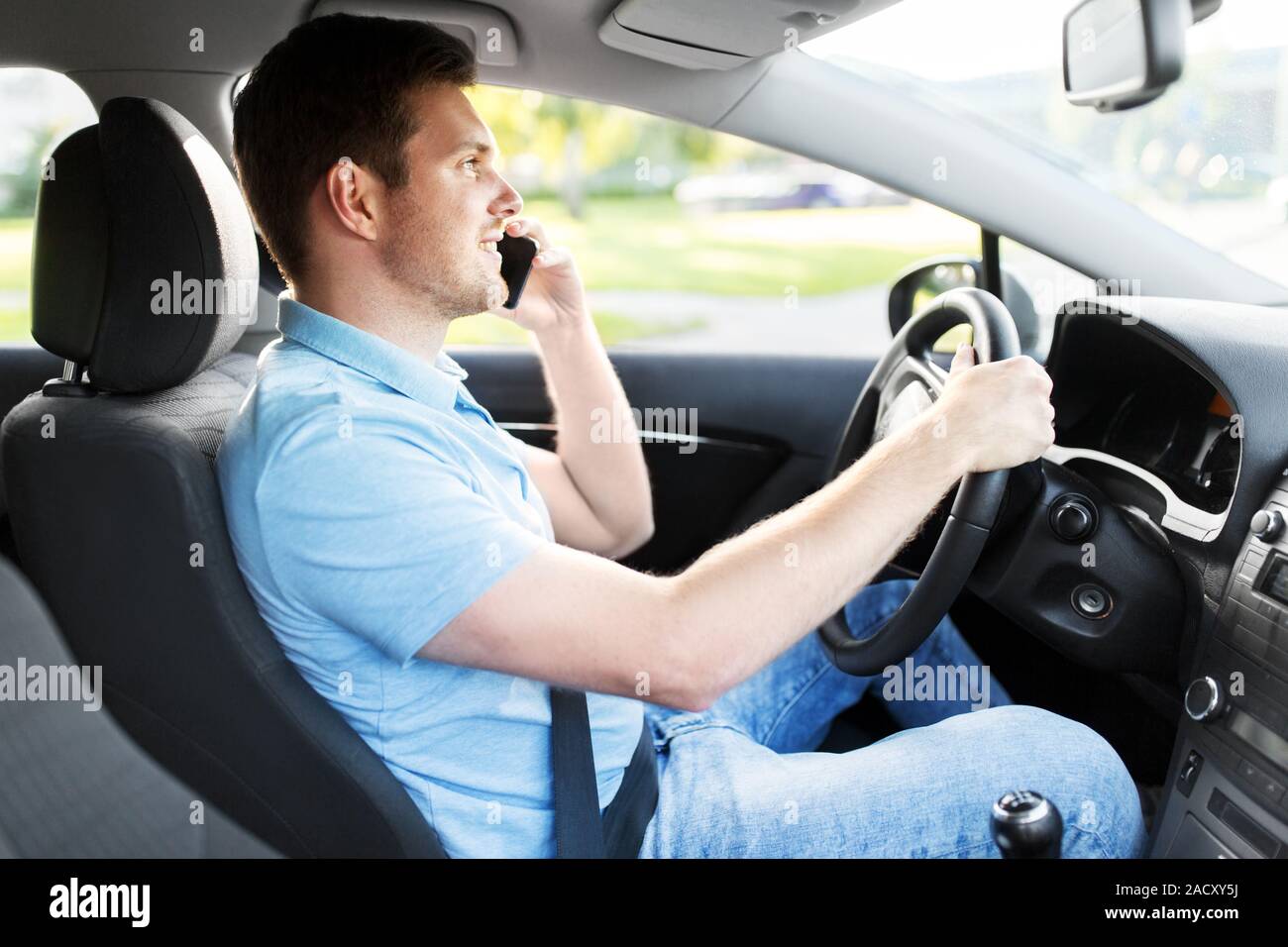 transport, vehicle and people concept - smiling man or driver driving ...