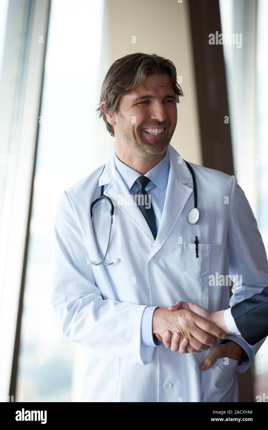 doctor handshake with a patient Stock Photo - Alamy