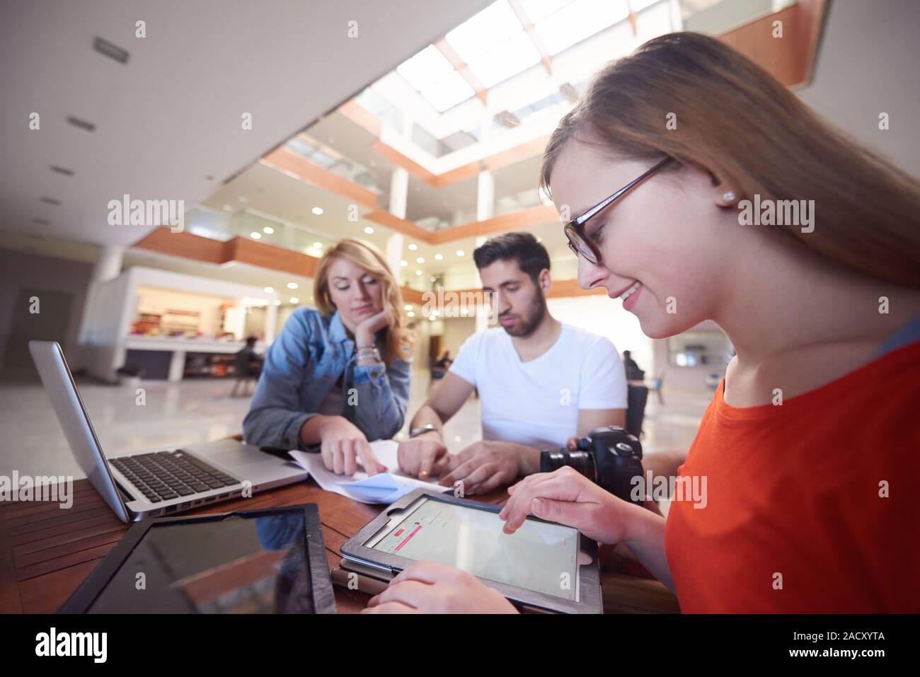 students group working on school project together Stock Photo - Alamy