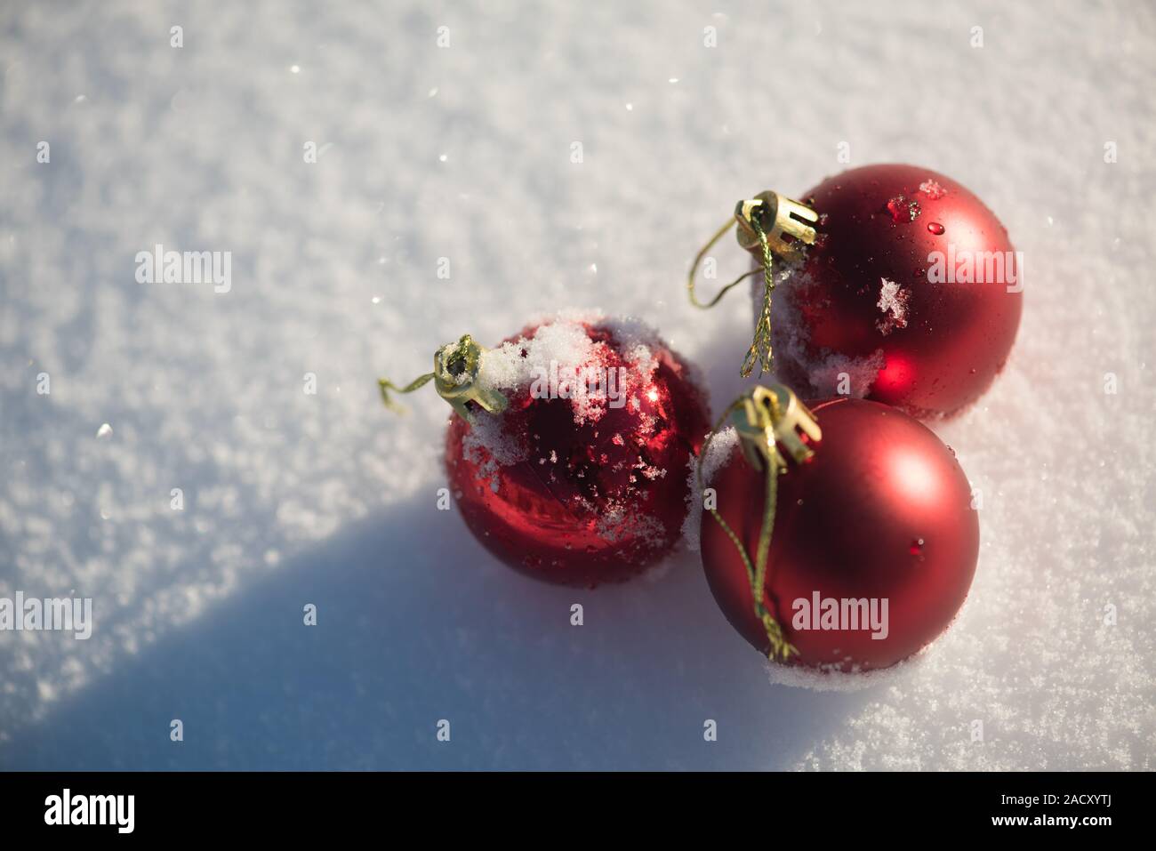 christmas ball in snow Stock Photo - Alamy