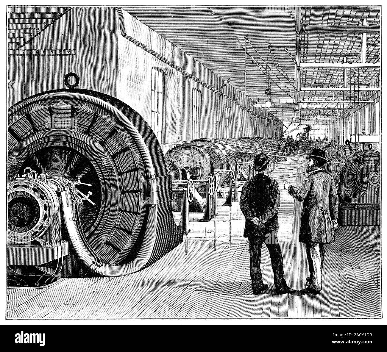 Rotary transformers. 19th-century artwork of workers standing by rotary ...