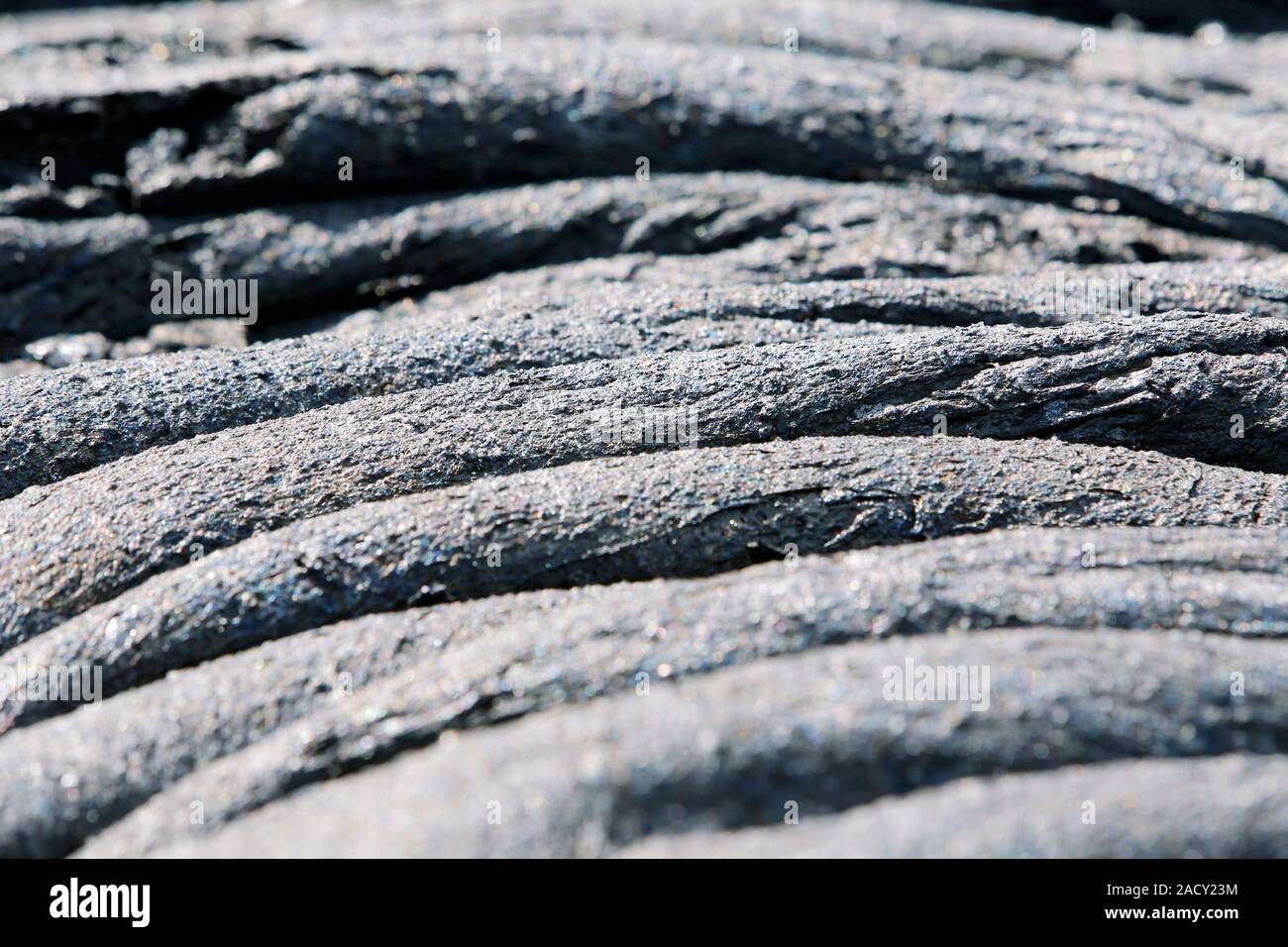 Pahoehoe lava. Close-up of cooled and hardened pahoehoe lava. This ...