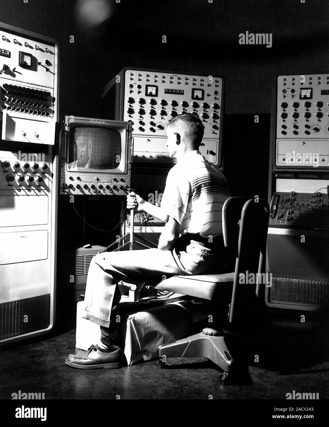 US Air Force flight simulator. Engineer with a General Electric ...