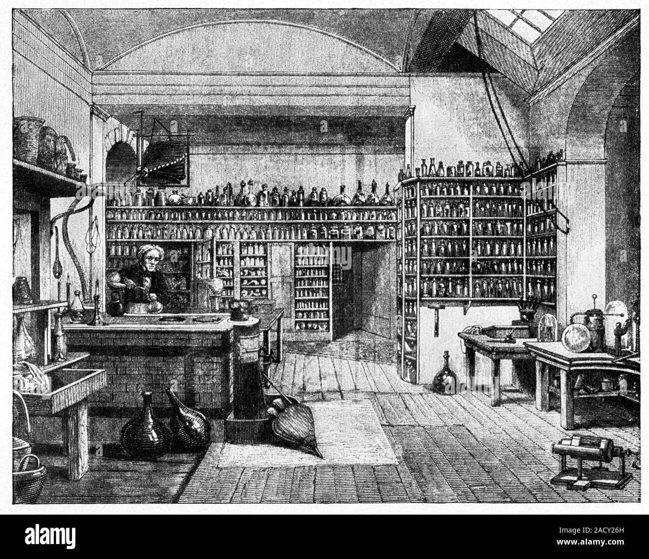 Michael Faraday (1791-1867) in his lab. Circa 1850 engraving of the ...