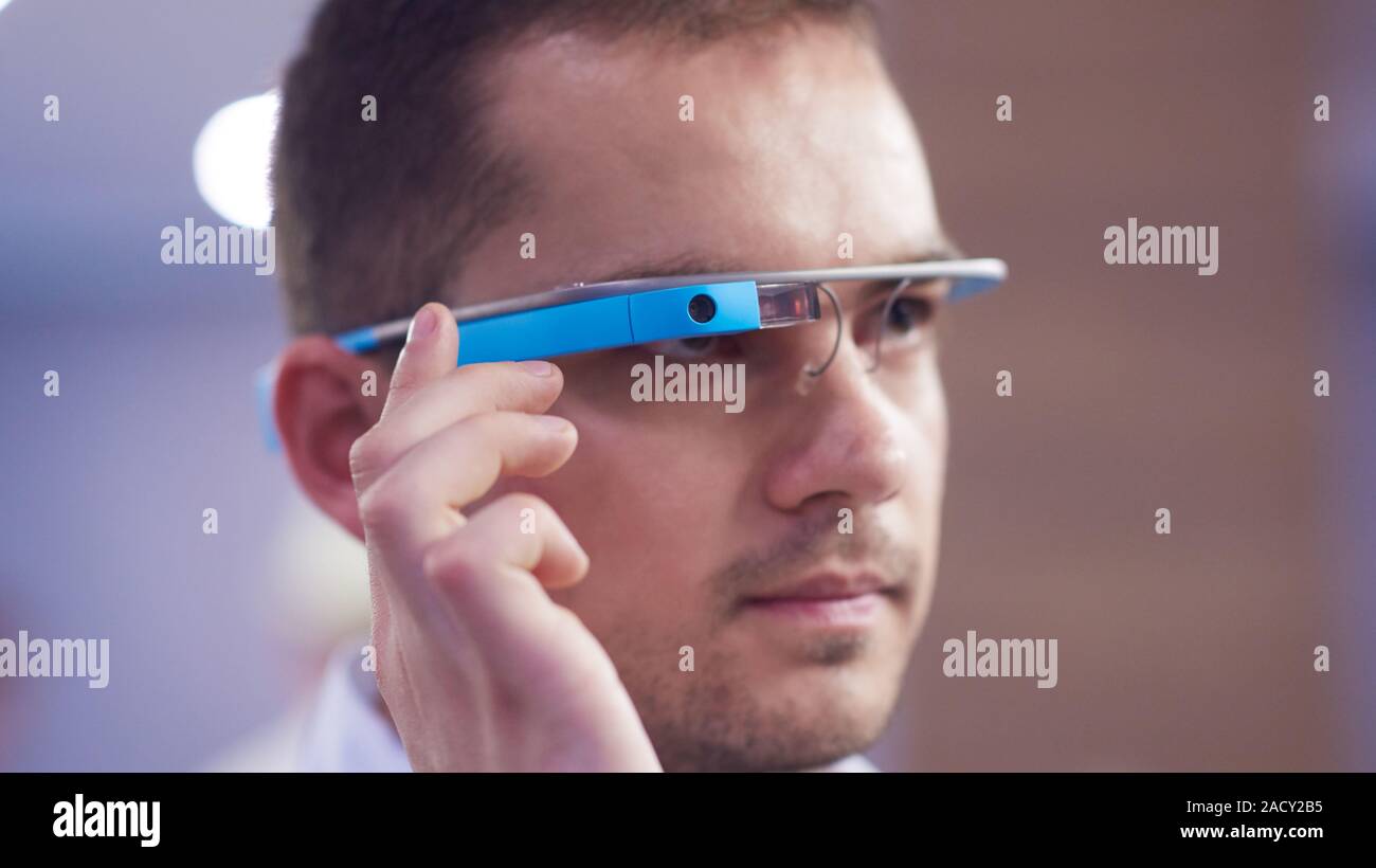 Man wearing futuristic eye glasses hi-res stock photography and images ...