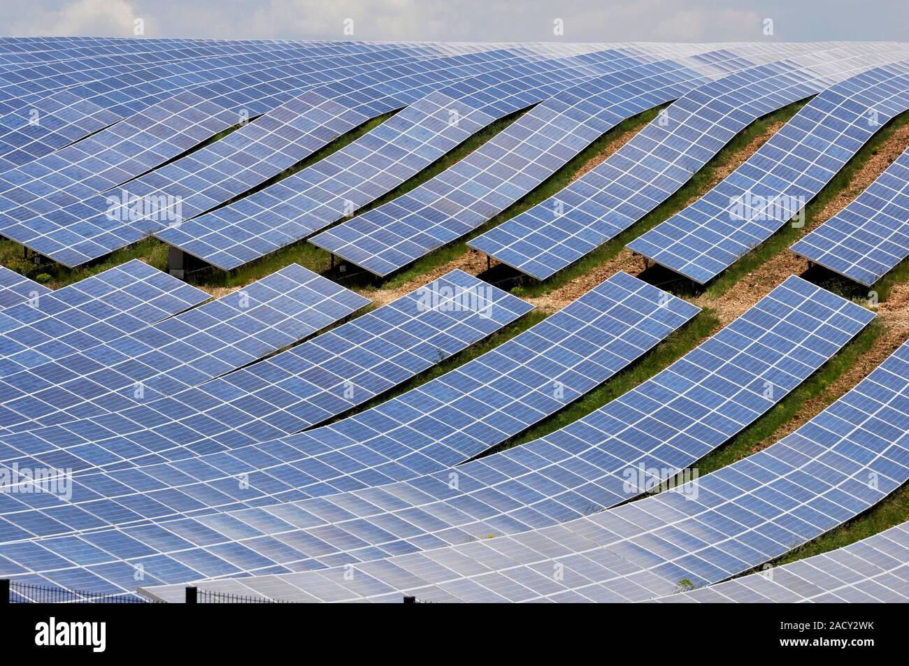 Solar farm. Solar cells at a solar farm (photovoltaic power station) in ...