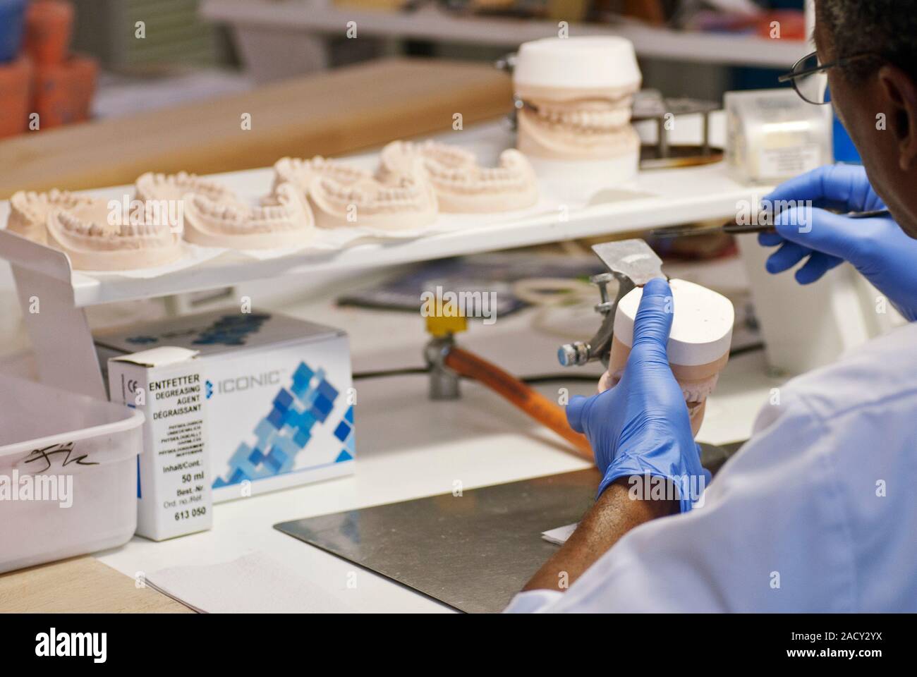 Making dentures. Person making dentures Stock Photo - Alamy