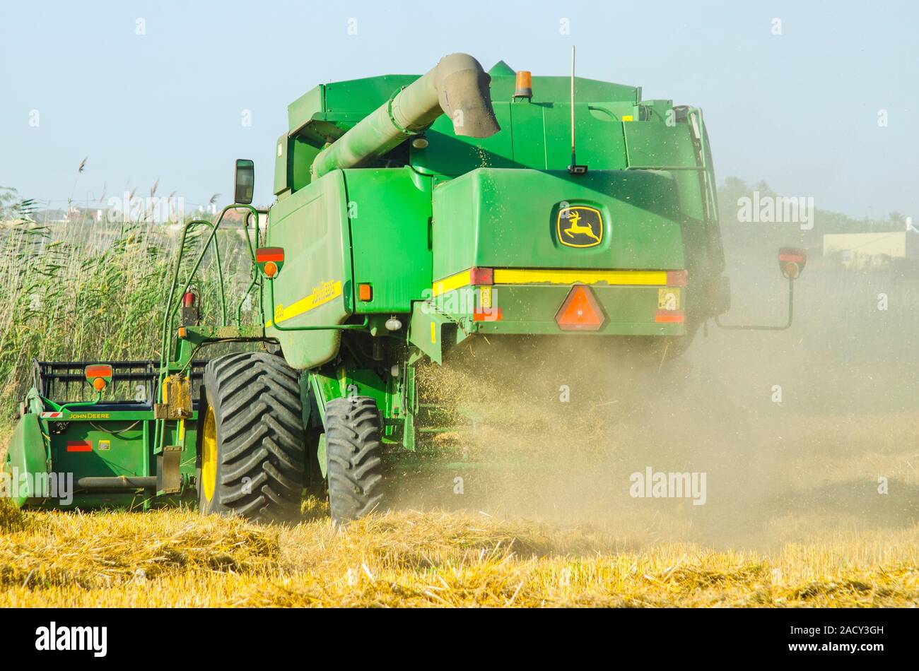 John Deere Combine harvester wheat Harvesting close up Stock Photo - Alamy