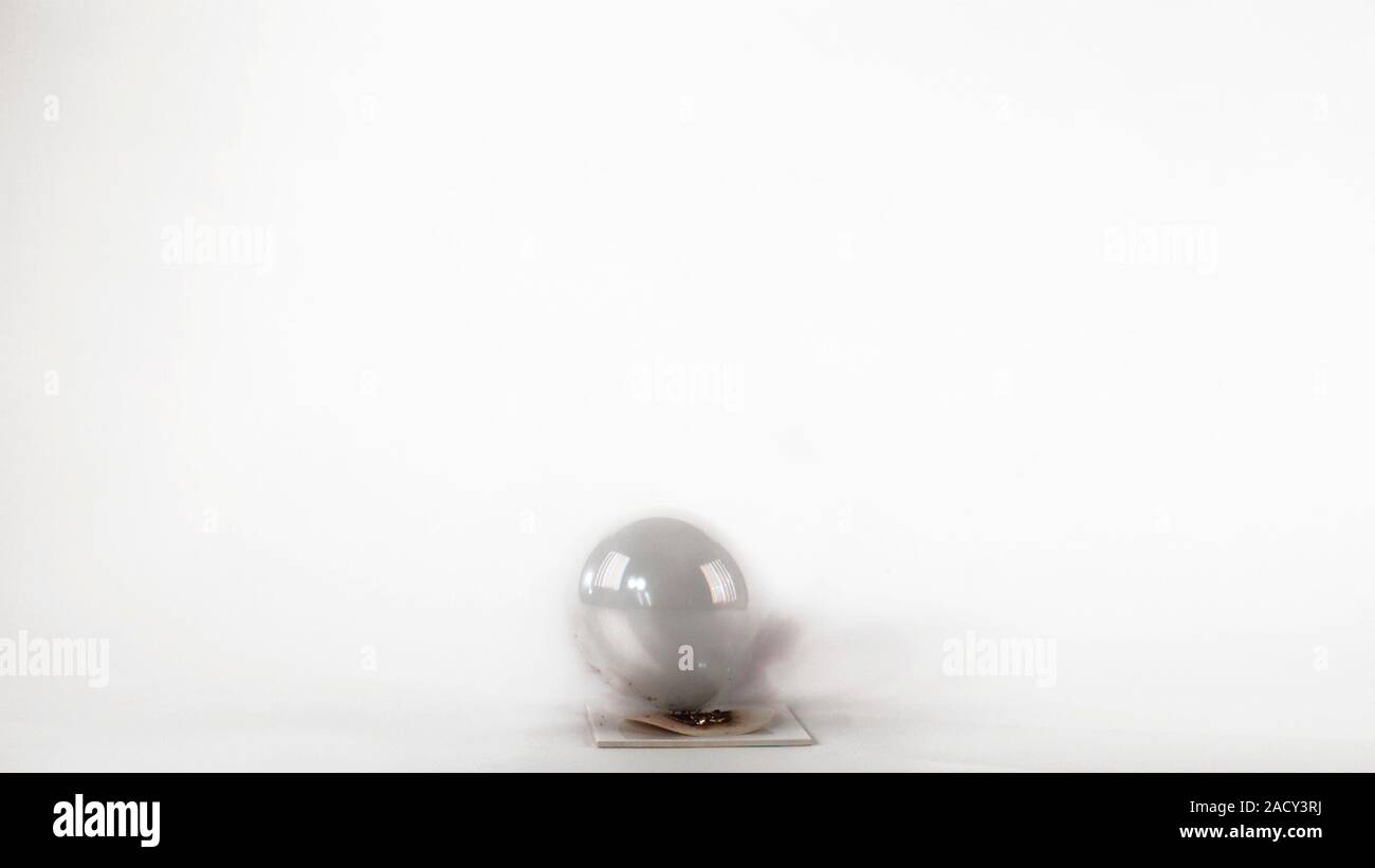 Nitrogen triiodide detonating (1 of 4) as a balloon is dropped onto it ...