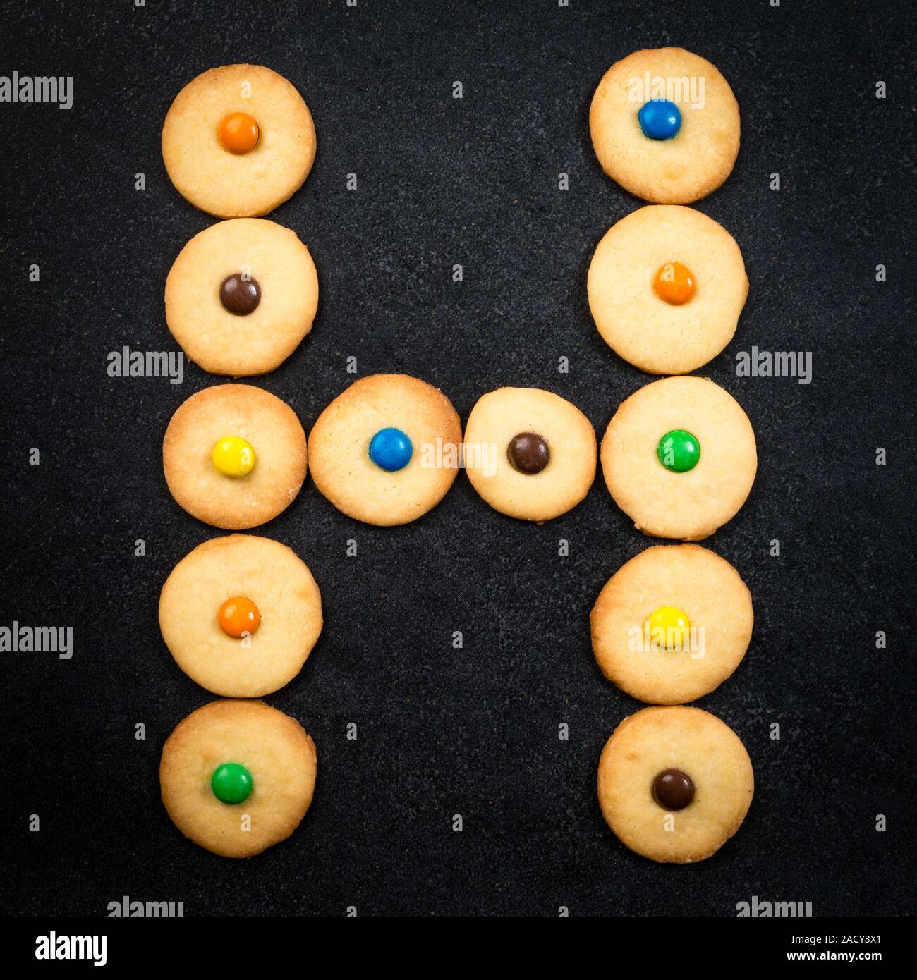 Homemade child cookies - H letter of the alphabet Stock Photo - Alamy