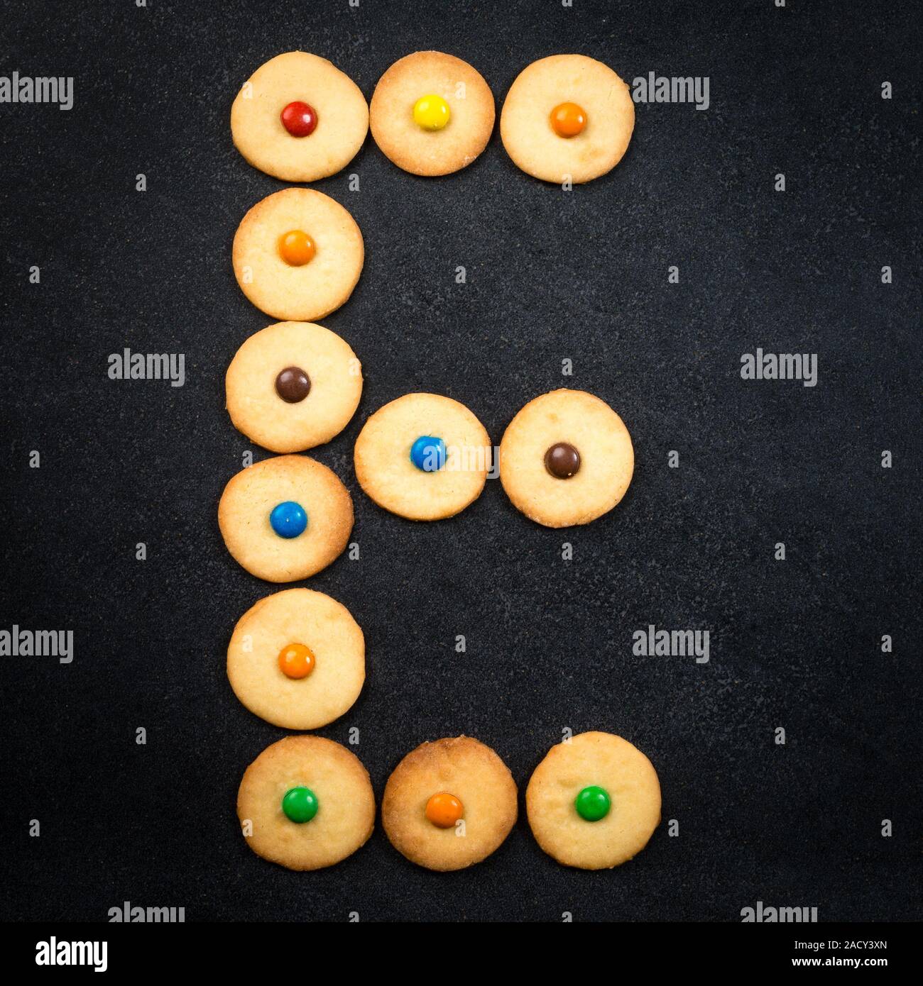 Homemade child cookies - E letter of the alphabet Stock Photo - Alamy