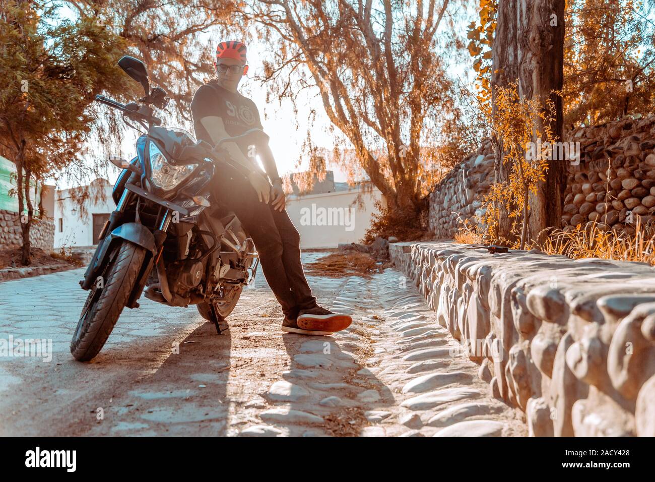 Biker on sport motorcycle outdoor on the road Stock Photo - Alamy