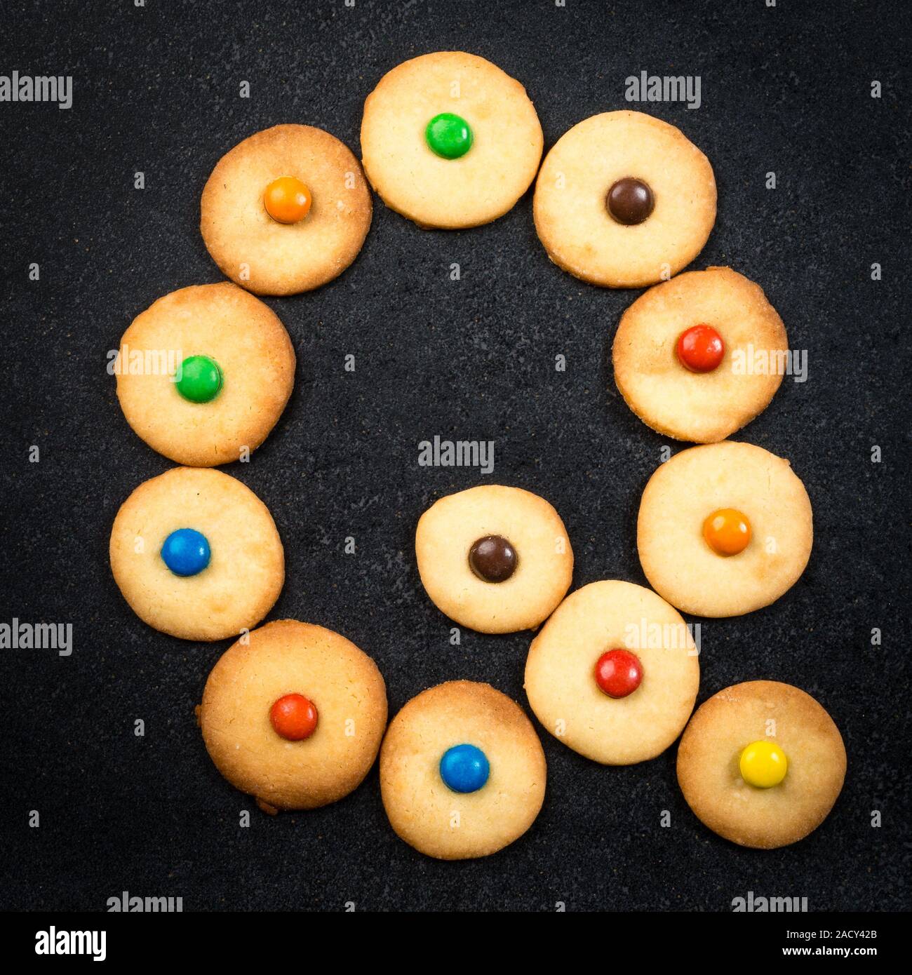 Homemade child cookies - Q letter of the alphabet Stock Photo - Alamy