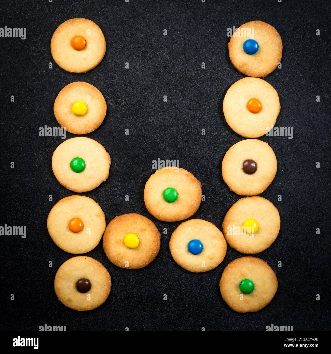 Homemade child cookies - W letter of the alphabet Stock Photo - Alamy