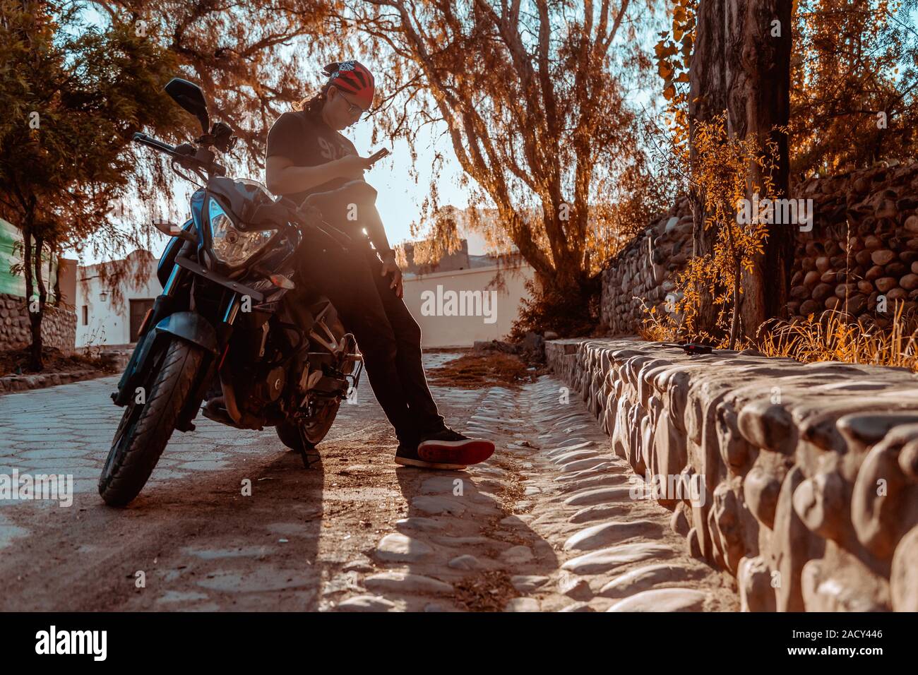 Biker on sport motorcycle outdoor on the road Stock Photo - Alamy