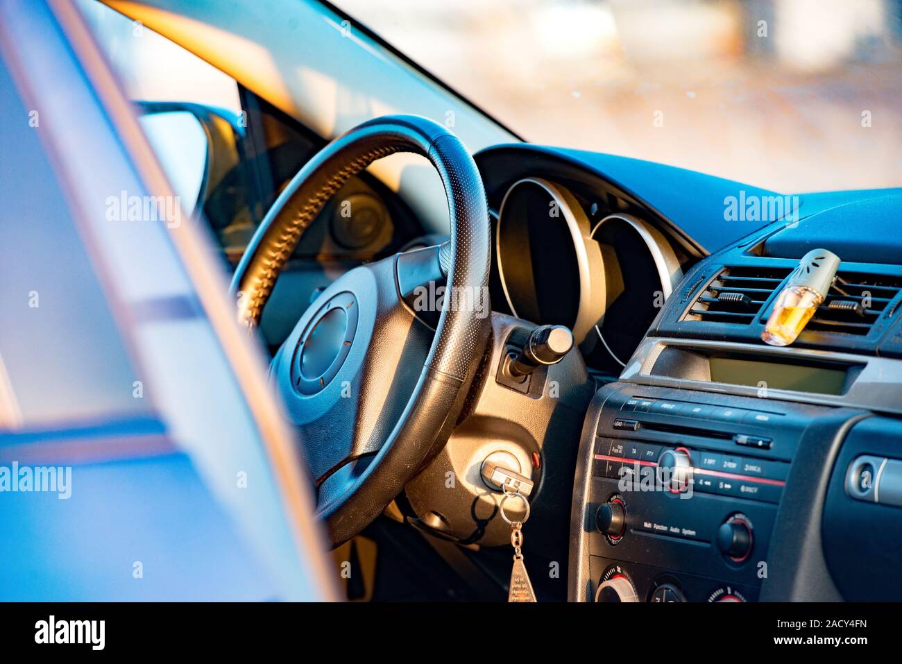 Interior view of car focus on the steering wheel Stock Photo - Alamy