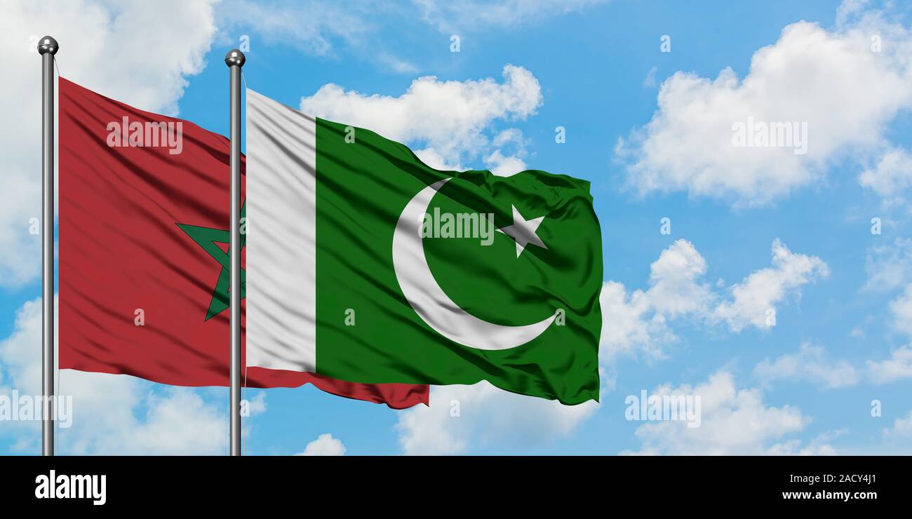 Morocco and Pakistan flag waving in the wind against white cloudy blue ...