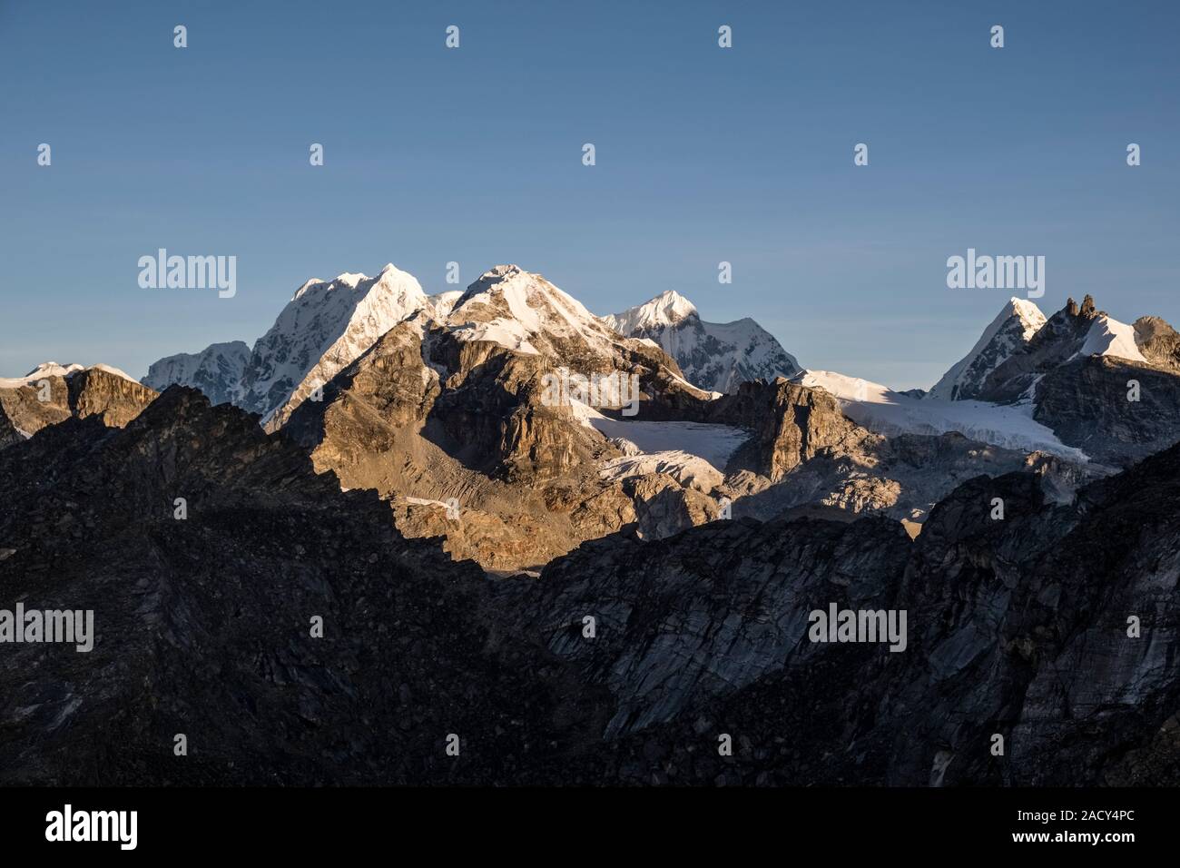 Snow covered summits, seen from summit of Gokyo Ri, at sunrise Stock ...