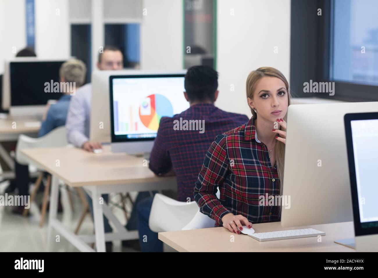 startup business, woman working on desktop computer Stock Photo - Alamy