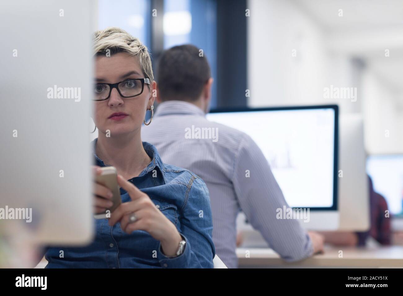 startup business, woman working on desktop computer Stock Photo - Alamy