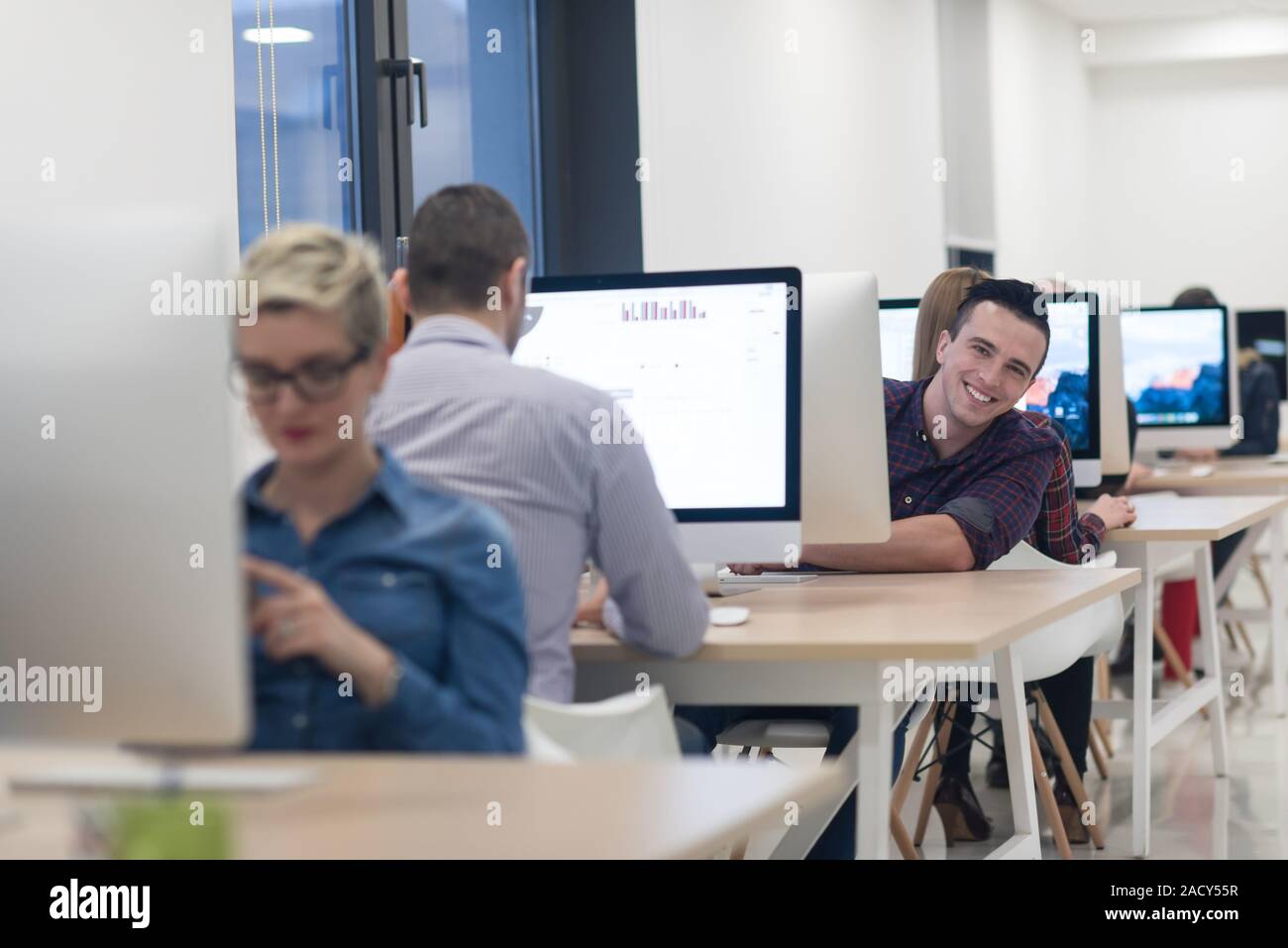 startup business, software developer working on desktop computer Stock Photo - Alamy