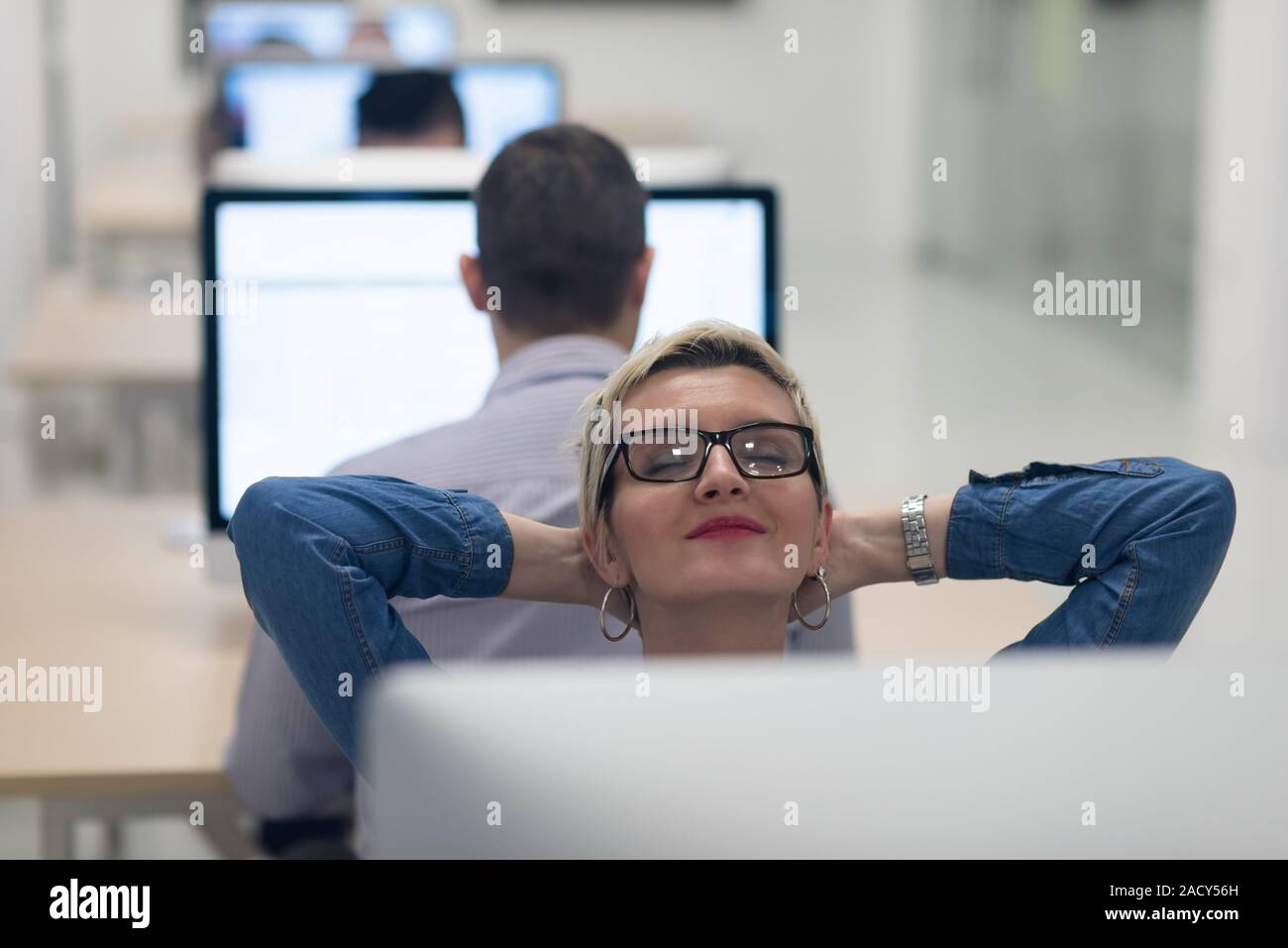 startup business, woman working on desktop computer Stock Photo - Alamy