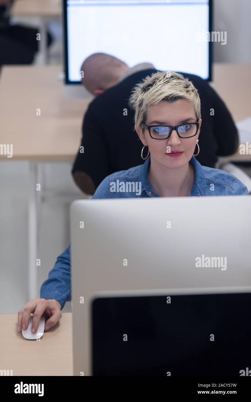startup business, woman working on desktop computer Stock Photo - Alamy