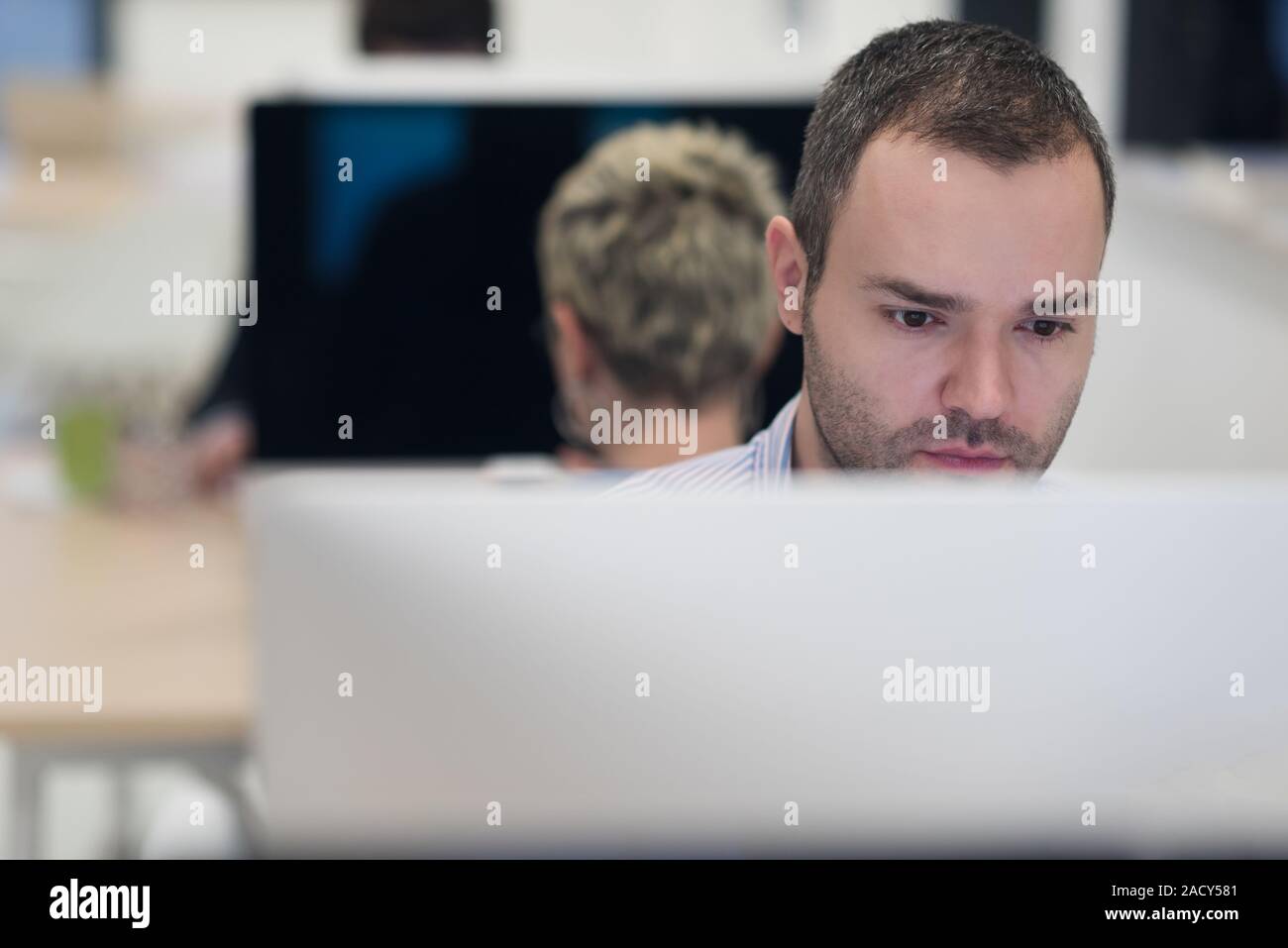 startup business, software developer working on desktop computer Stock Photo - Alamy