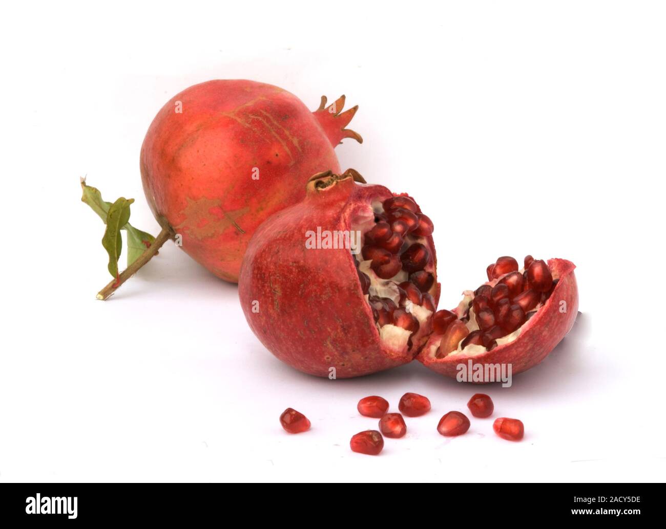 Pomegranate isolated on white background Stock Photo - Alamy