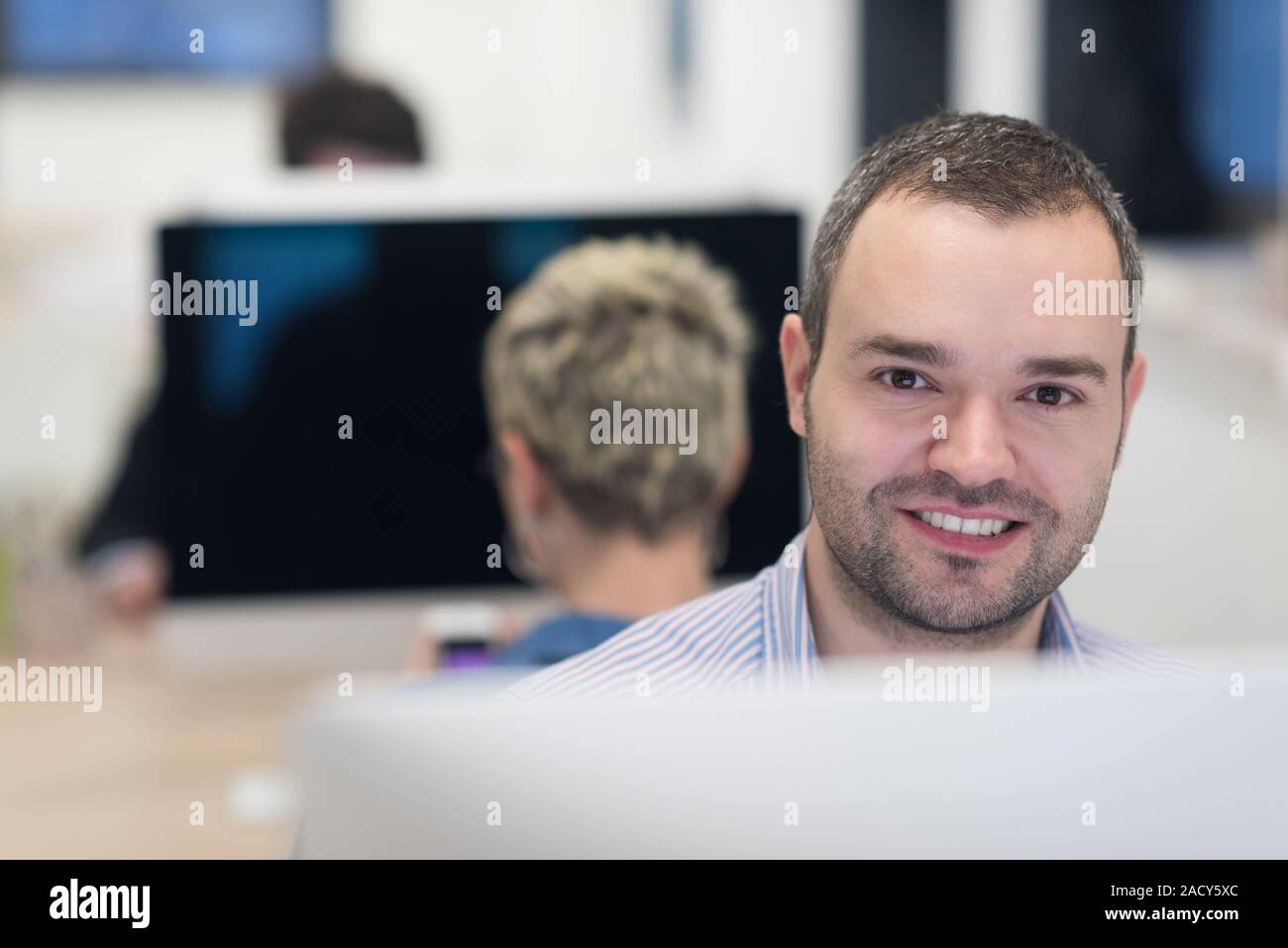 startup business, software developer working on desktop computer Stock Photo - Alamy
