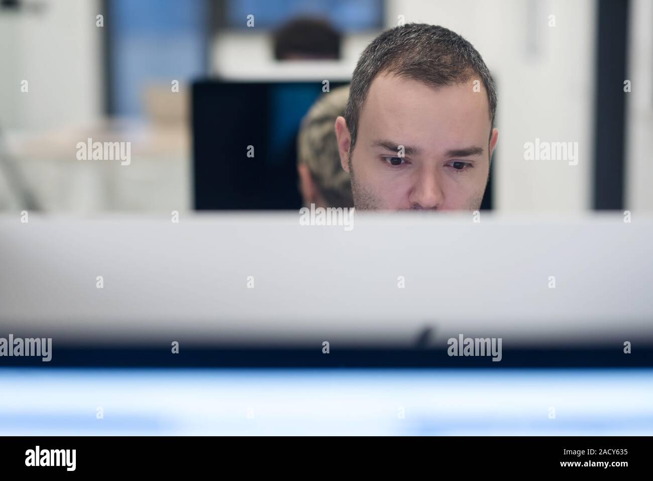 startup business, software developer working on desktop computer Stock Photo - Alamy