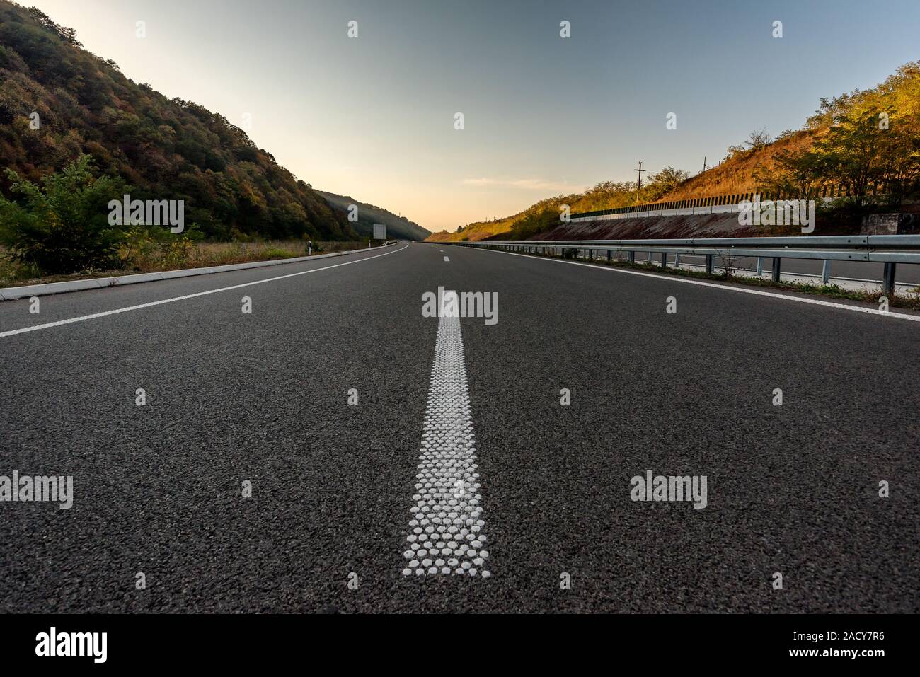 Empty silent Asphalt highway road with close up white markings Stock ...
