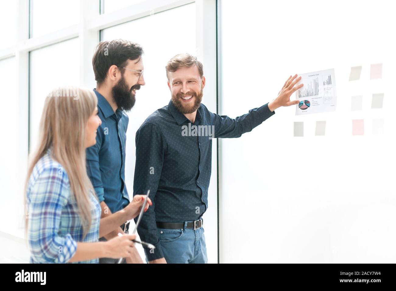 successful boss is discussing with the staff of financial performance ...
