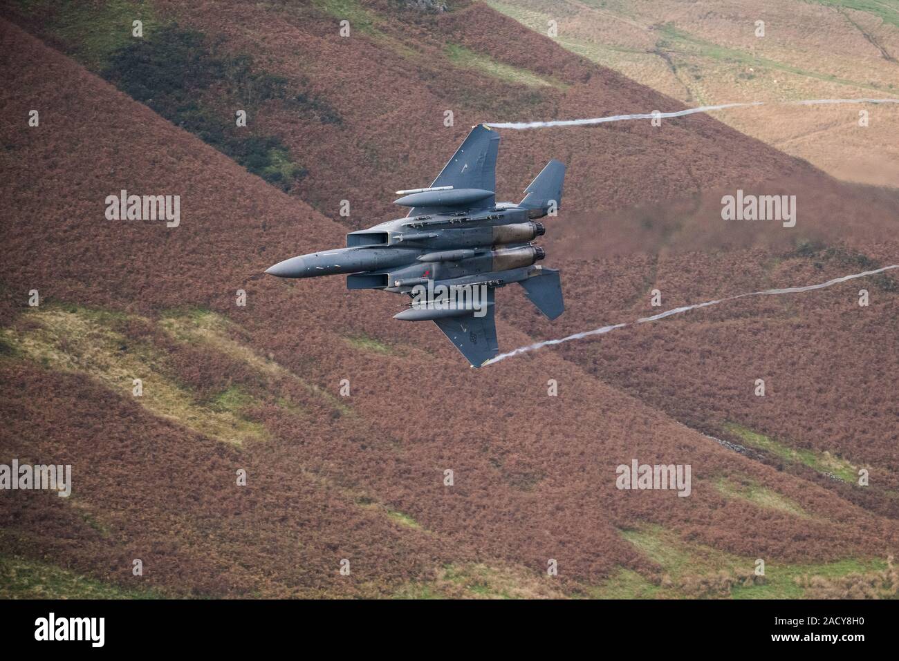 F-15 Eagle, USAF Mc Donnell Douglas low-level fighter jet flying from ...
