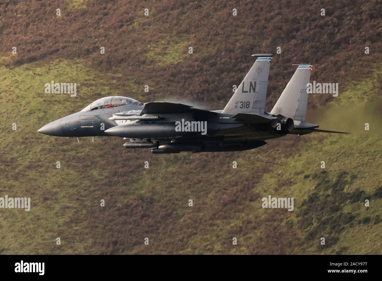 F-15 Eagle, USAF Mc Donnell Douglas low-level fighter jet flying from ...