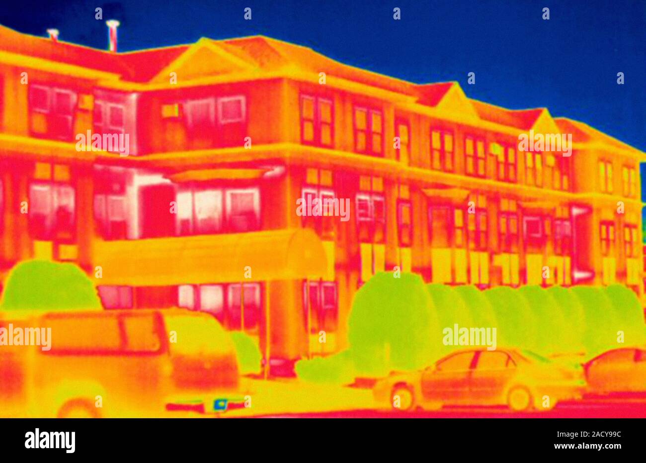 Thermogram of the exterior of a housing complex during winter showing ...