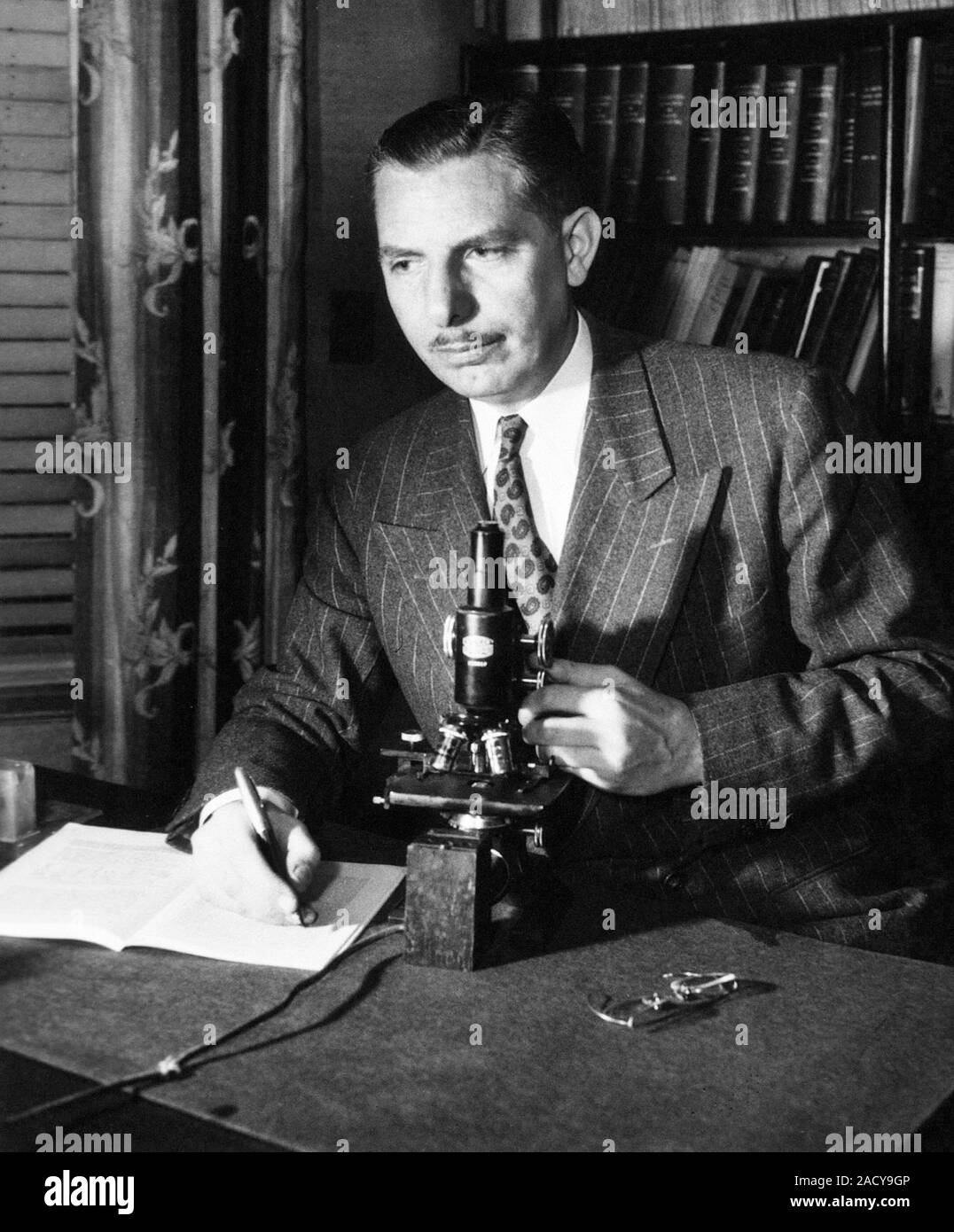 Alexander Solomon Wiener (1907-1976), US haematologist, using a ...