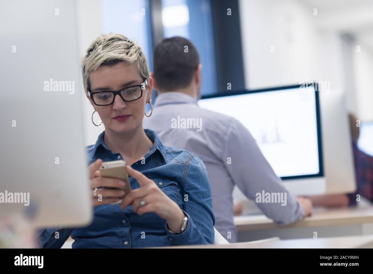 startup business, woman working on desktop computer Stock Photo - Alamy
