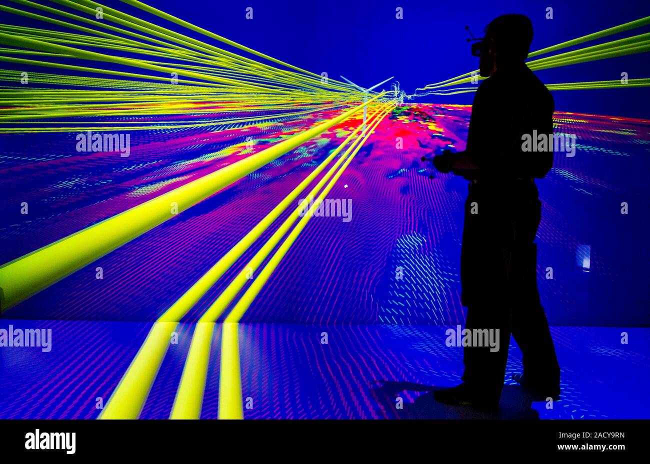Visualisation lab. Scientist examining the velocity field from a wind ...