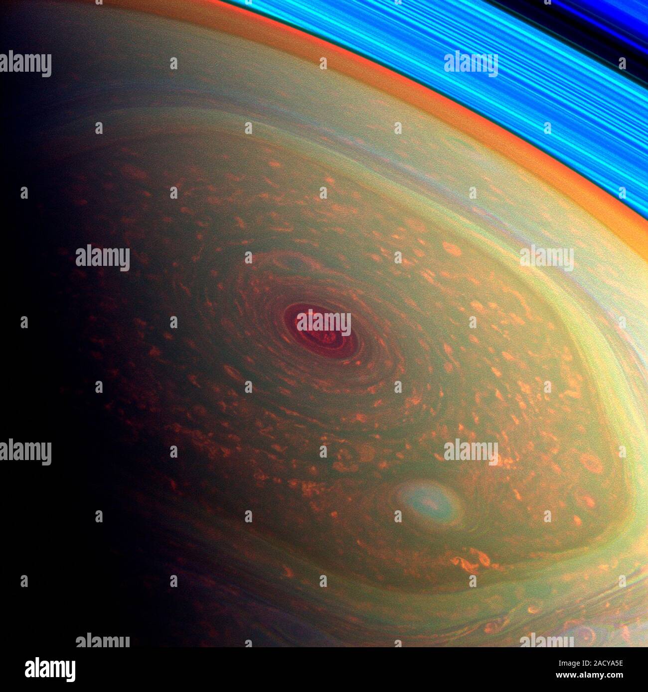 Saturn's north polar storm. Sunlit view of the spinning vortex of ...