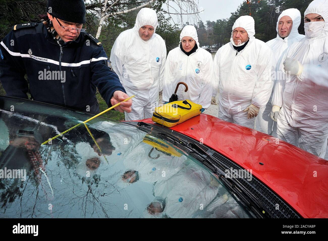 Policeman undergoing forensic training. They are being shown how to ...