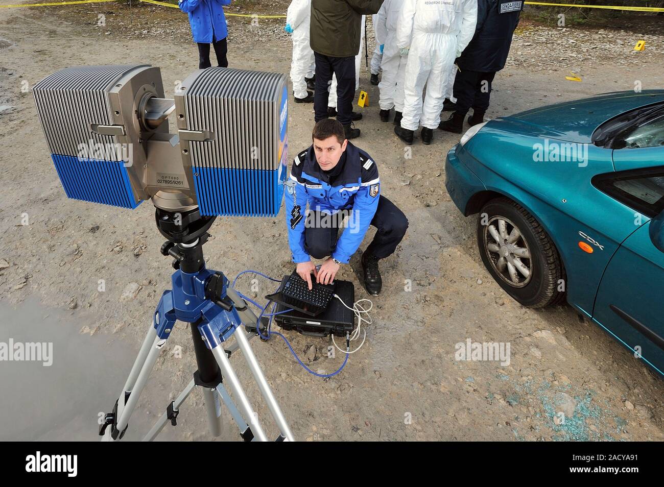 Forensic training. 3D laser scanner being used to record a detailed ...